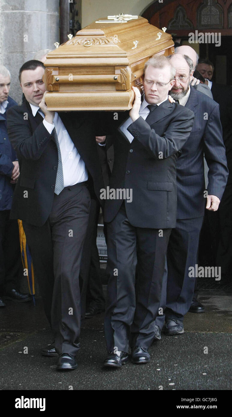 The coffin of folk singer Liam Clancy is carried from St Mary's Church ...