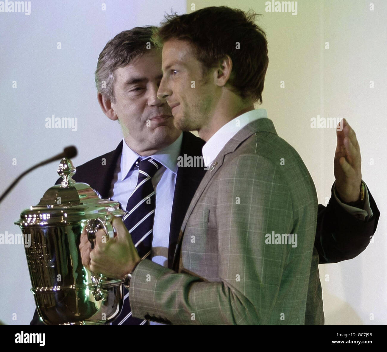 Formula One World Champion Jenson Button, (right), is congratulated by ...