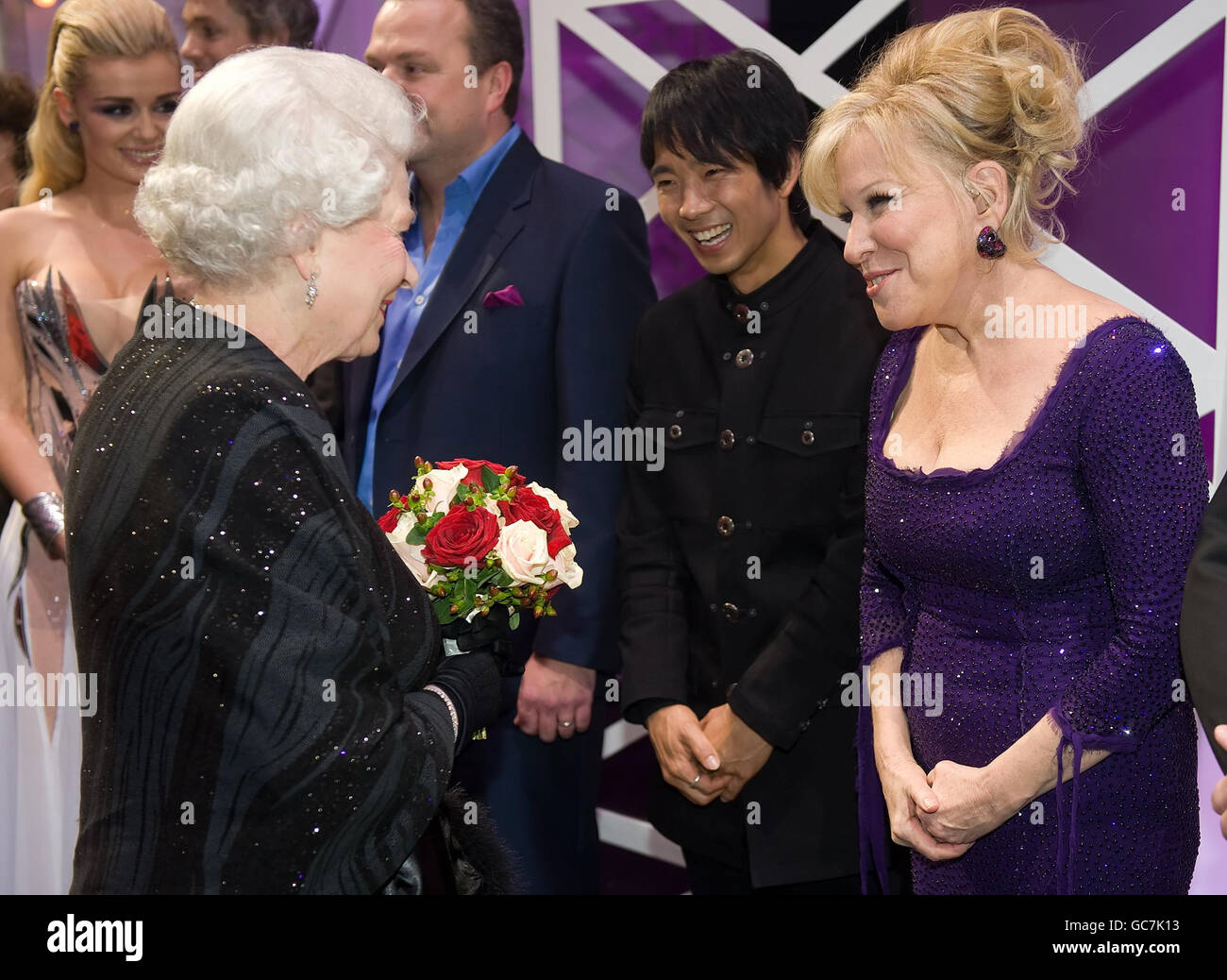 Queen Elizabeth II meets American singer Bette Midler (right) following ...