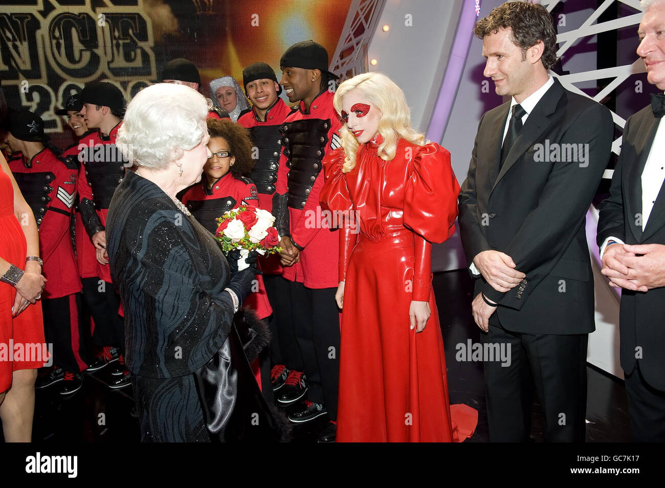 Queen Elizabeth II meets American singer Lady Gaga (right) following ...