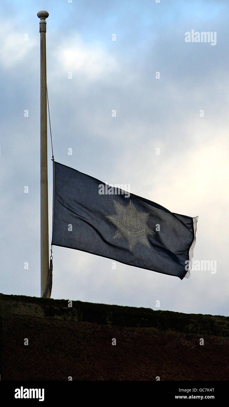 The Regimental Flag of The Royal Anglian Regiment flies at half mast ...