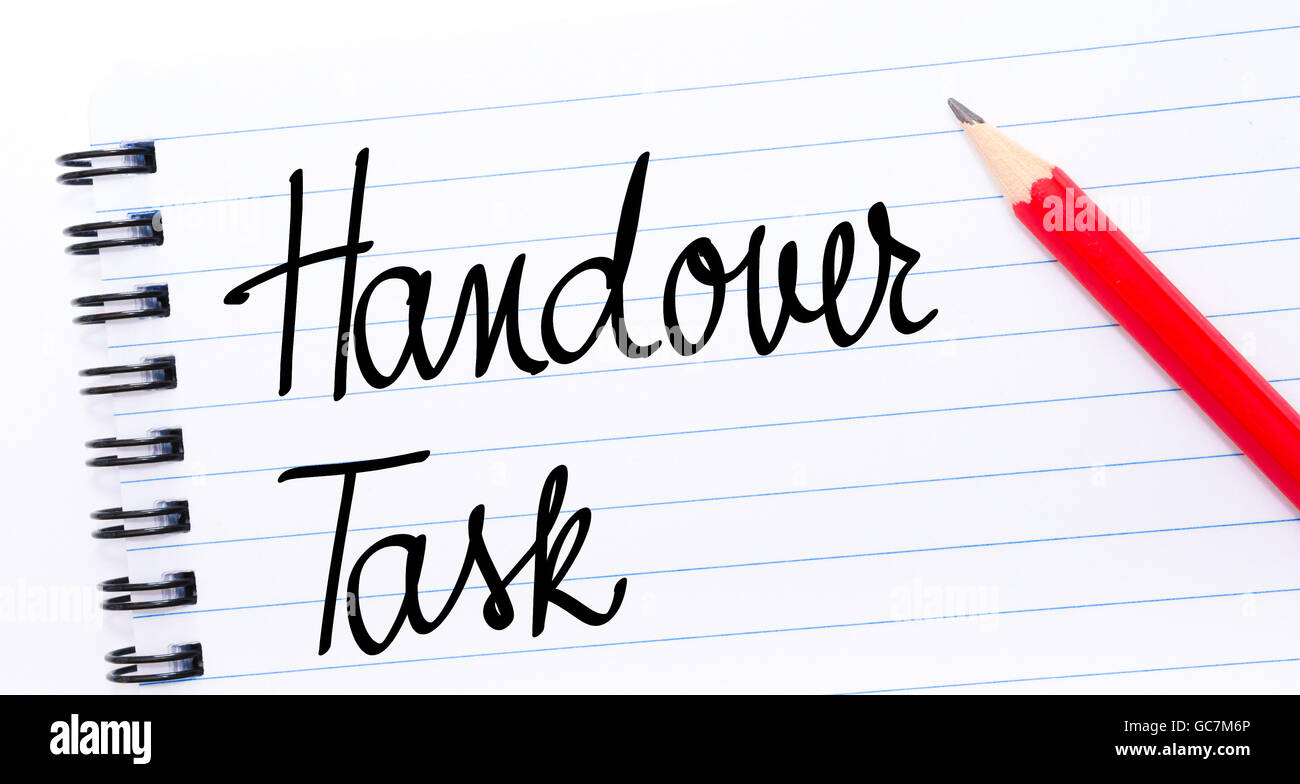 Handover Task written on notebook page with red pencil on the right ...