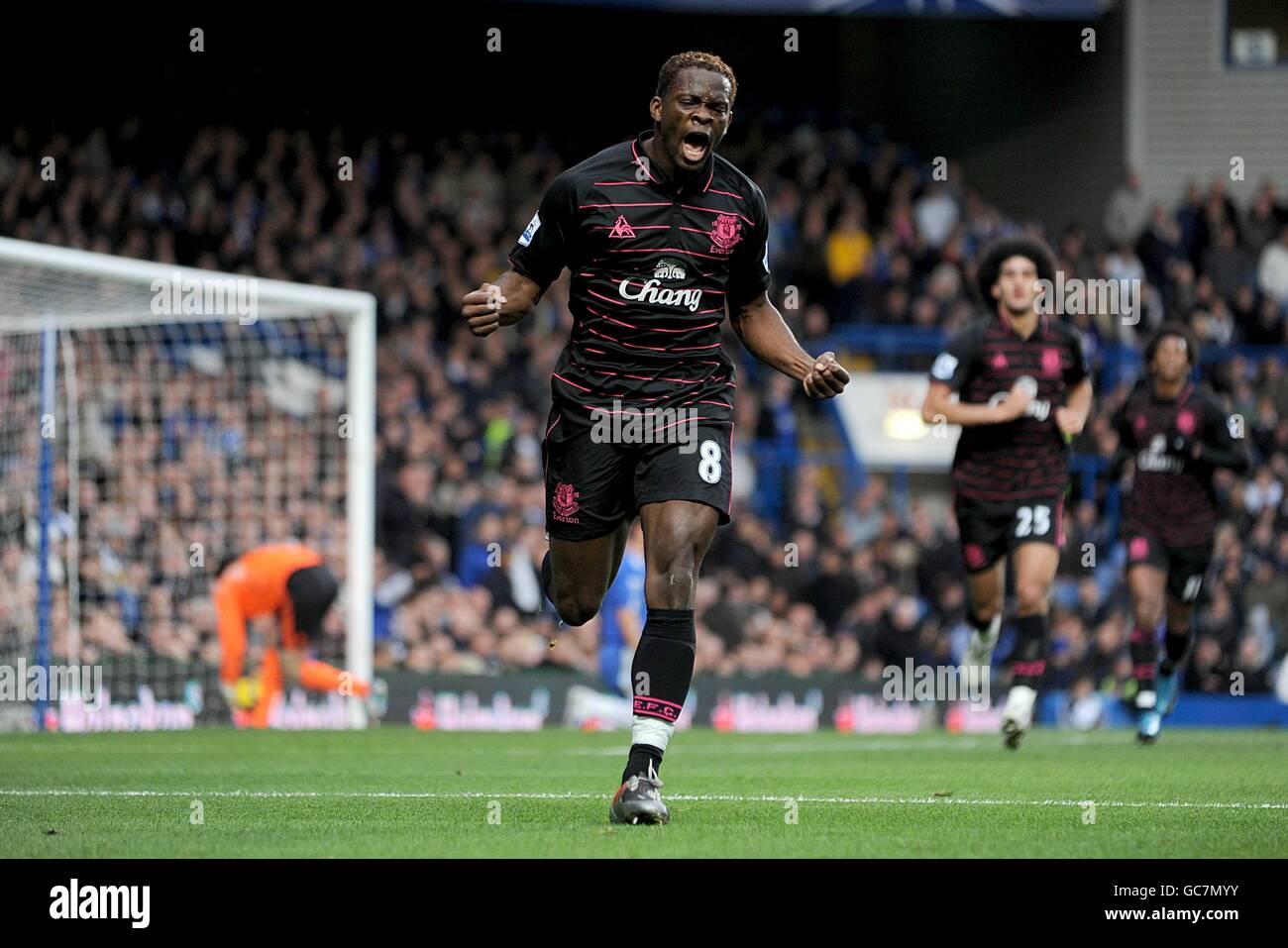 Everton's Louis Saha (centre) celebrates after Chelsea goalkeeper Petr ...