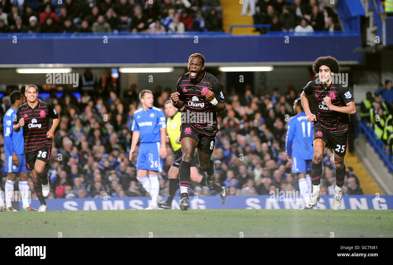Everton's Louis Saha (centre) celebrates after scoring the equaliser as ...