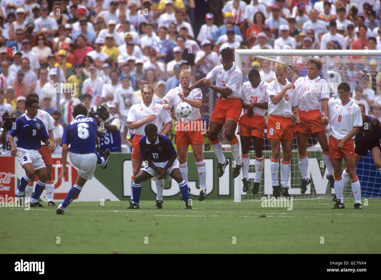 Brazil's Branco slams a free kick into the Dutch wall. Later in the ...