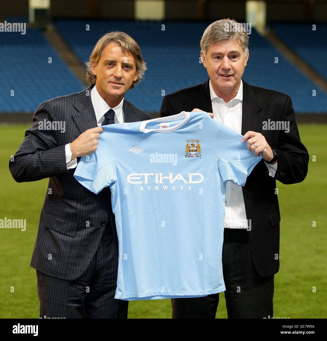 New Manchester City manager Roberto Mancini with new assistant manager ...
