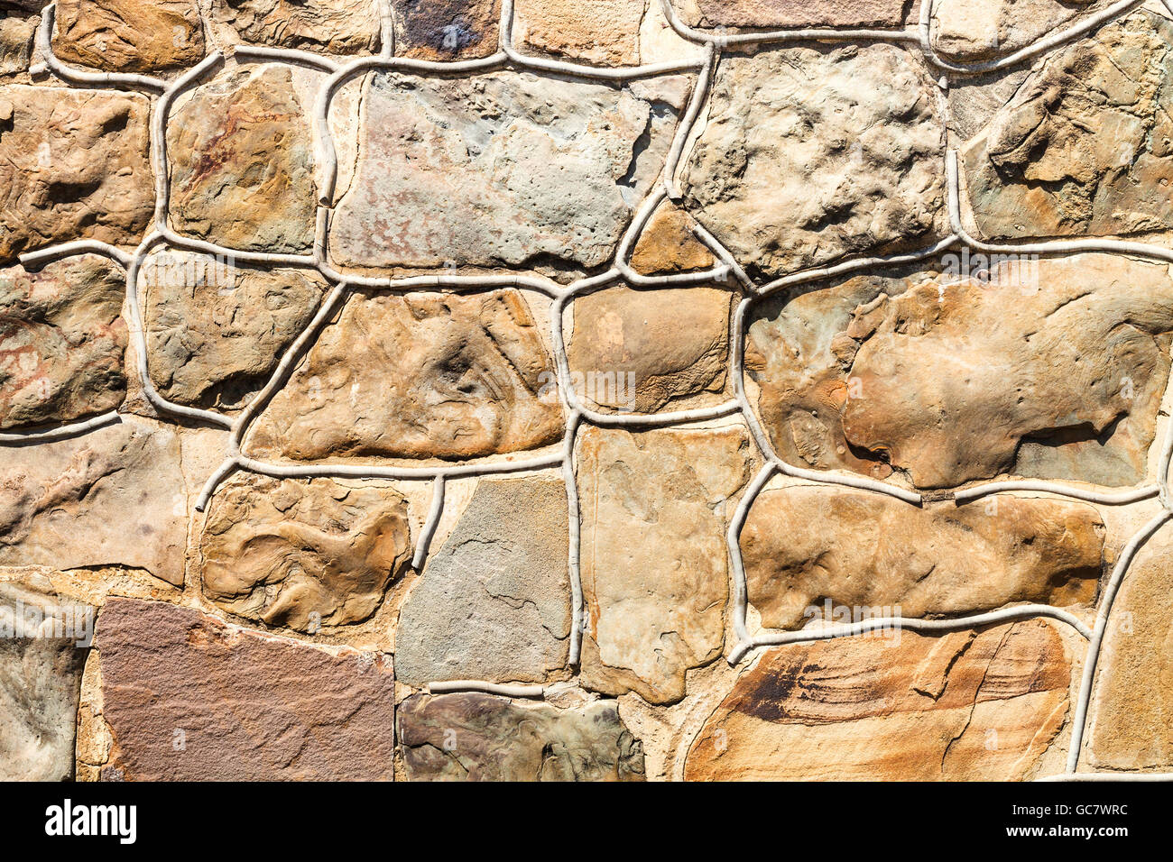 textured background - outdoor wall from natural stones Stock Photo - Alamy