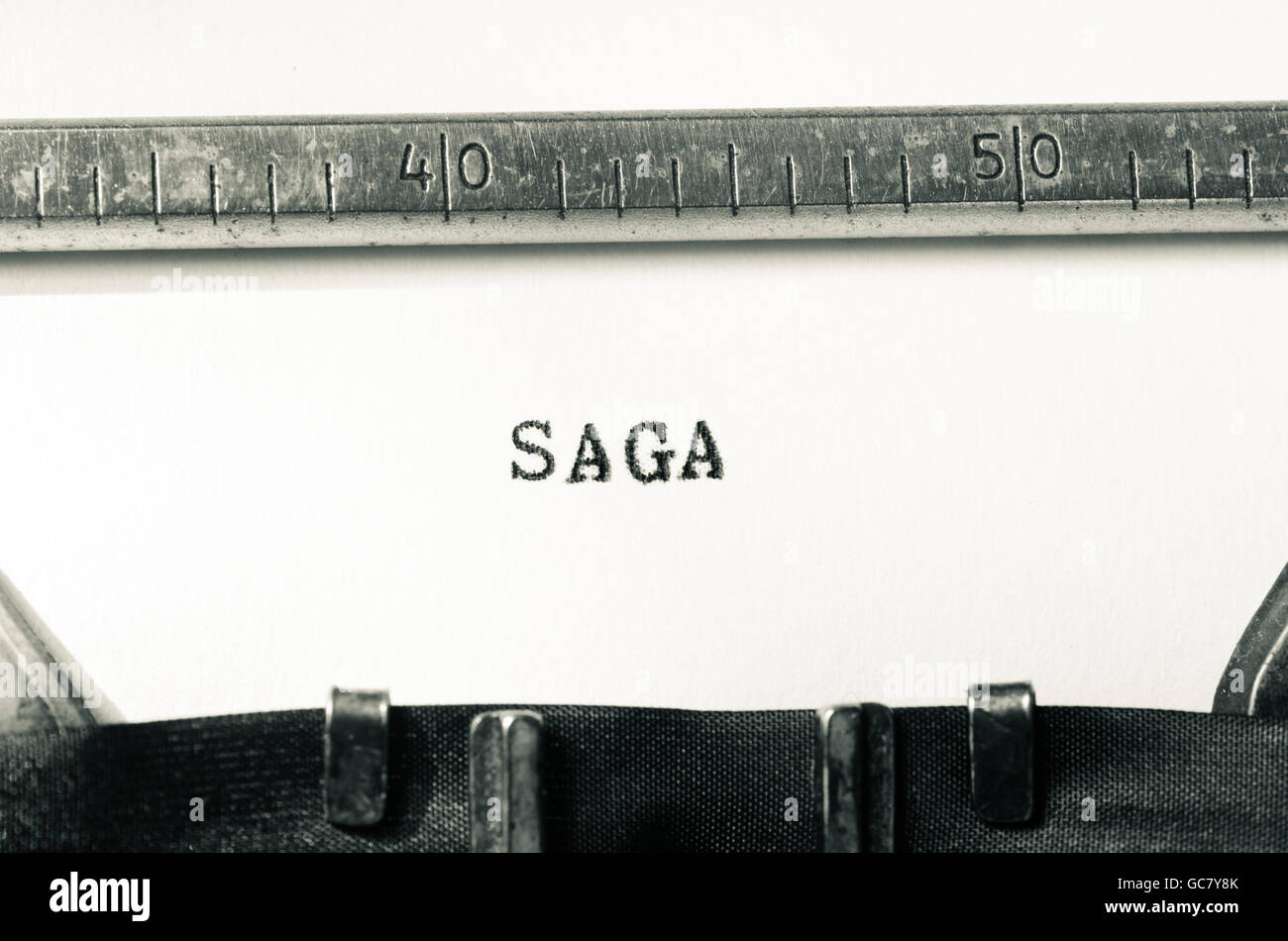 word saga typed on old typewriter Stock Photo - Alamy