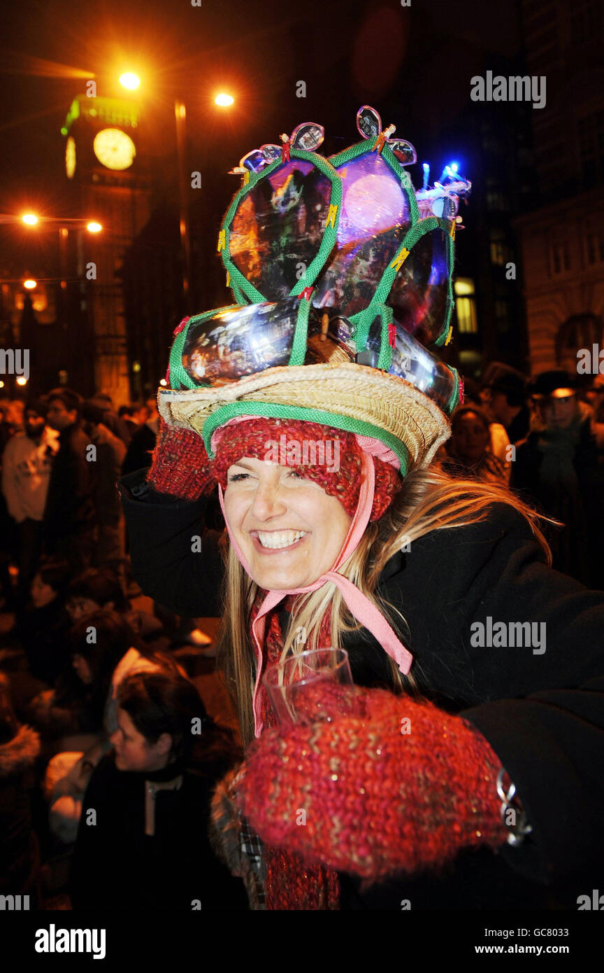 Sadie Collins, awaits a pyrotechnic display on London's South Bank ...