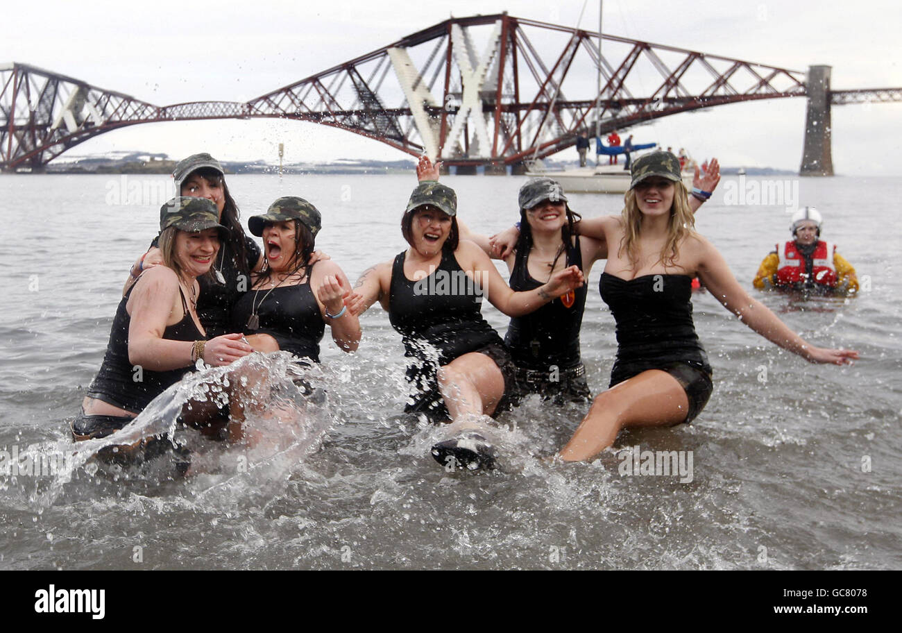 Loony Dookers take part in the annual charity Loony Dook plunge into ...