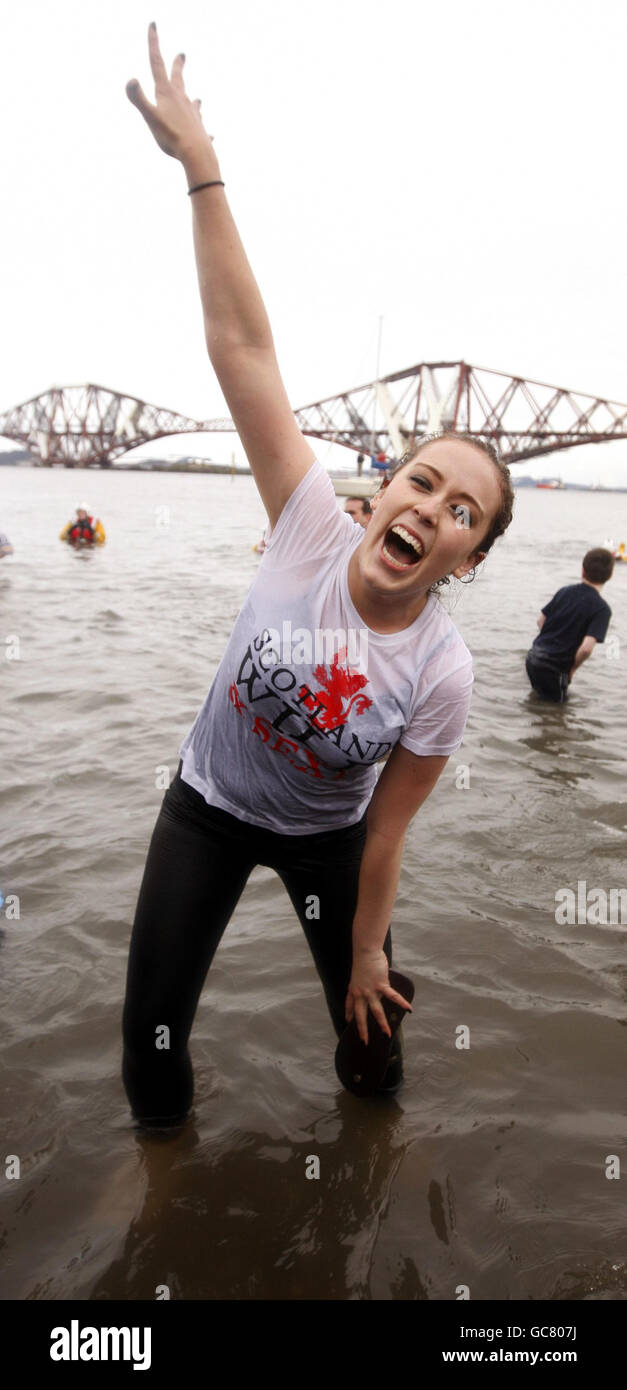 Loony Dookers take part in the annual charity Loony Dook plunge into ...