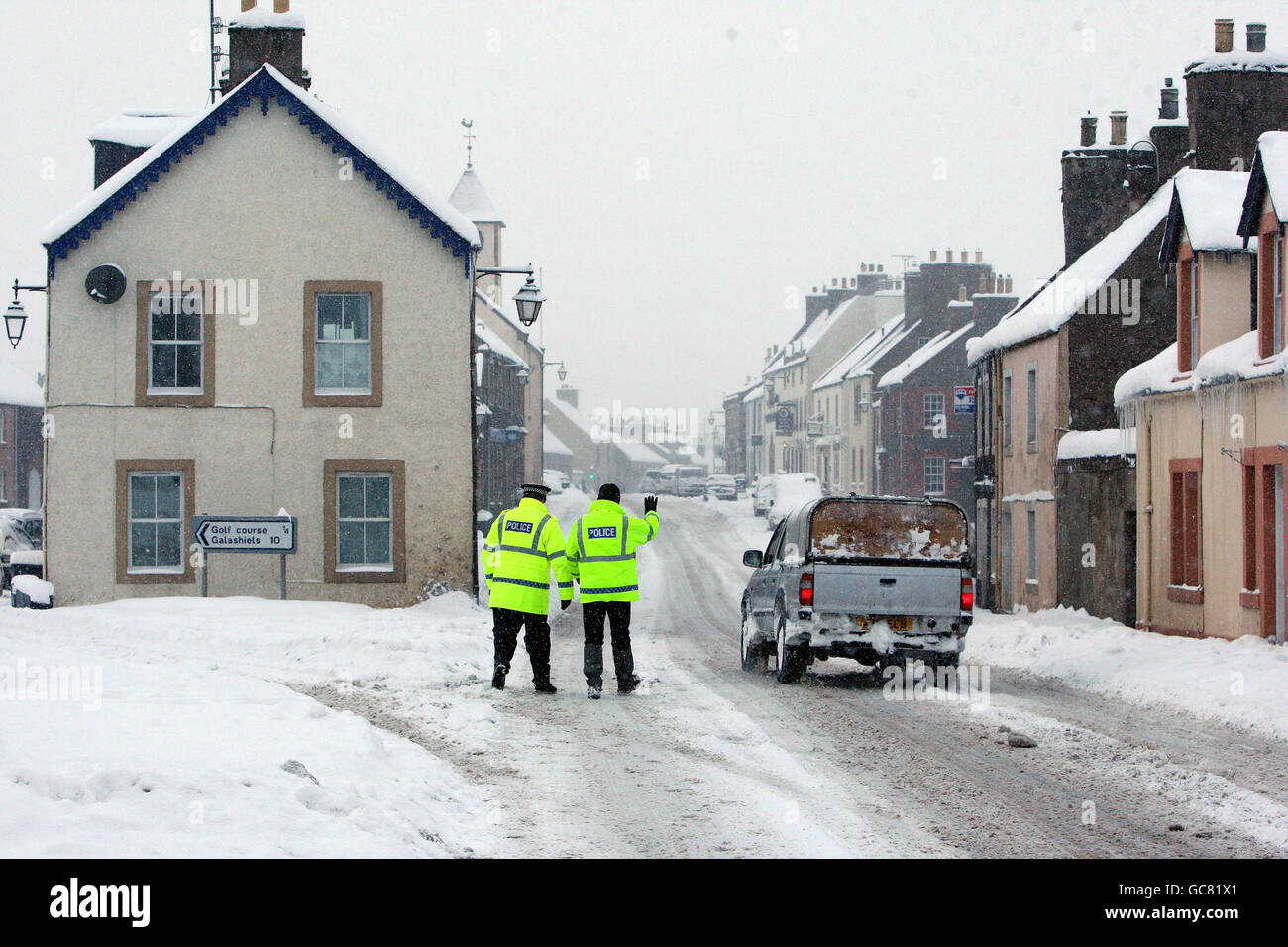 Police on patrol in the town of Lauder in Scotland, after heavy ...