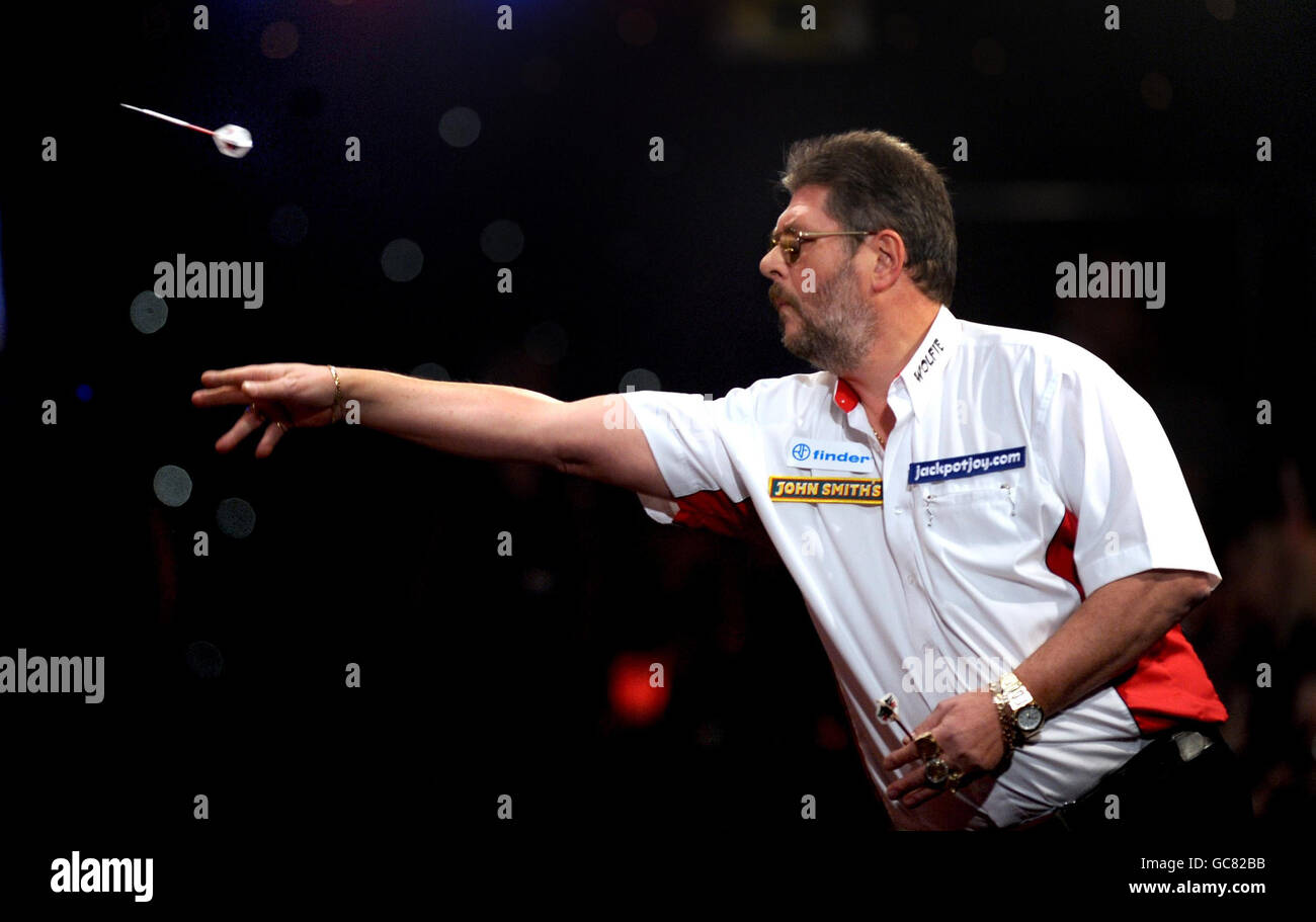 Martin Adams (pictured) competes against Daryl Gurney during the BDO ...