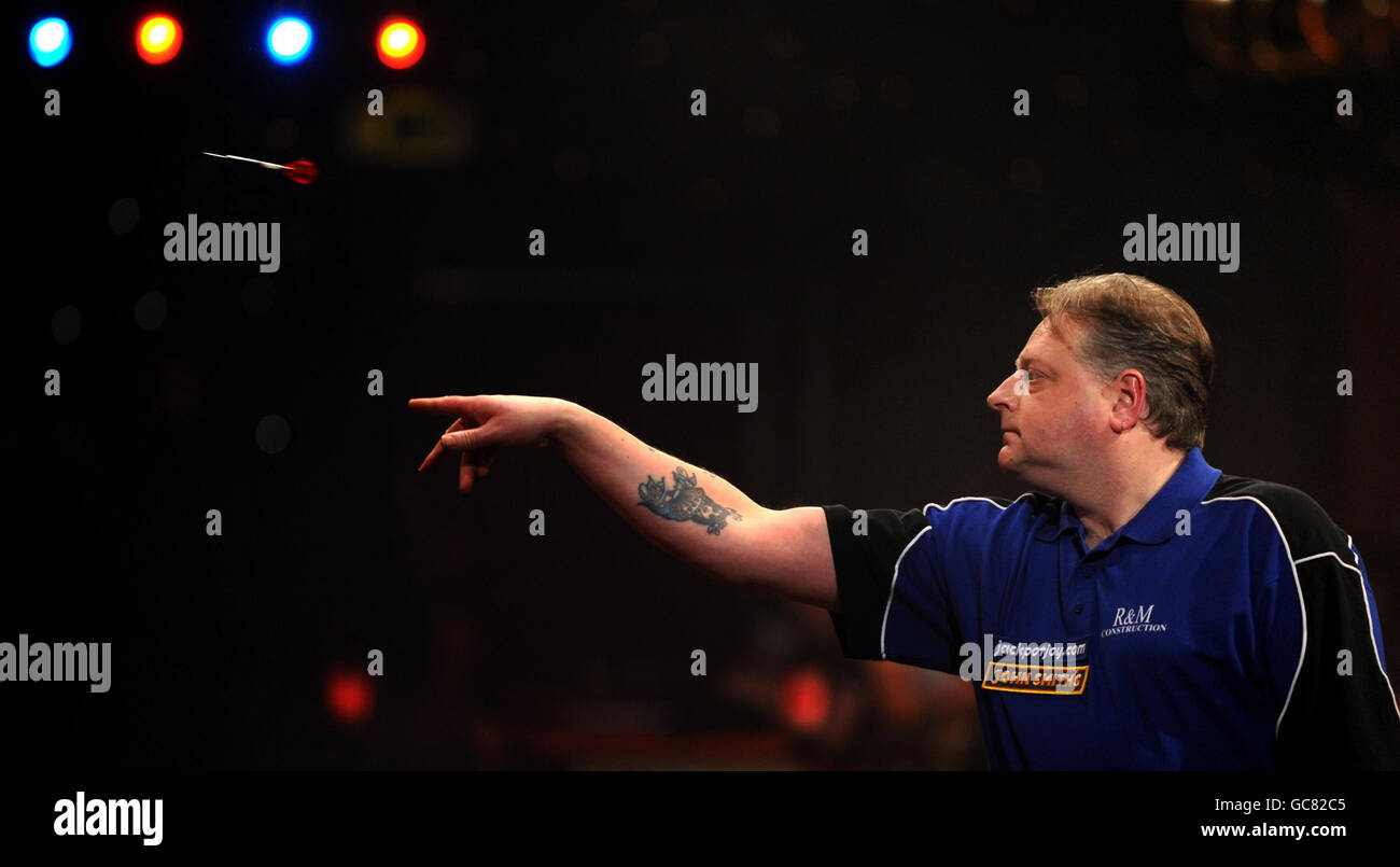 Garry Thompson (pictured) competes against Martin McCloskey during the ...