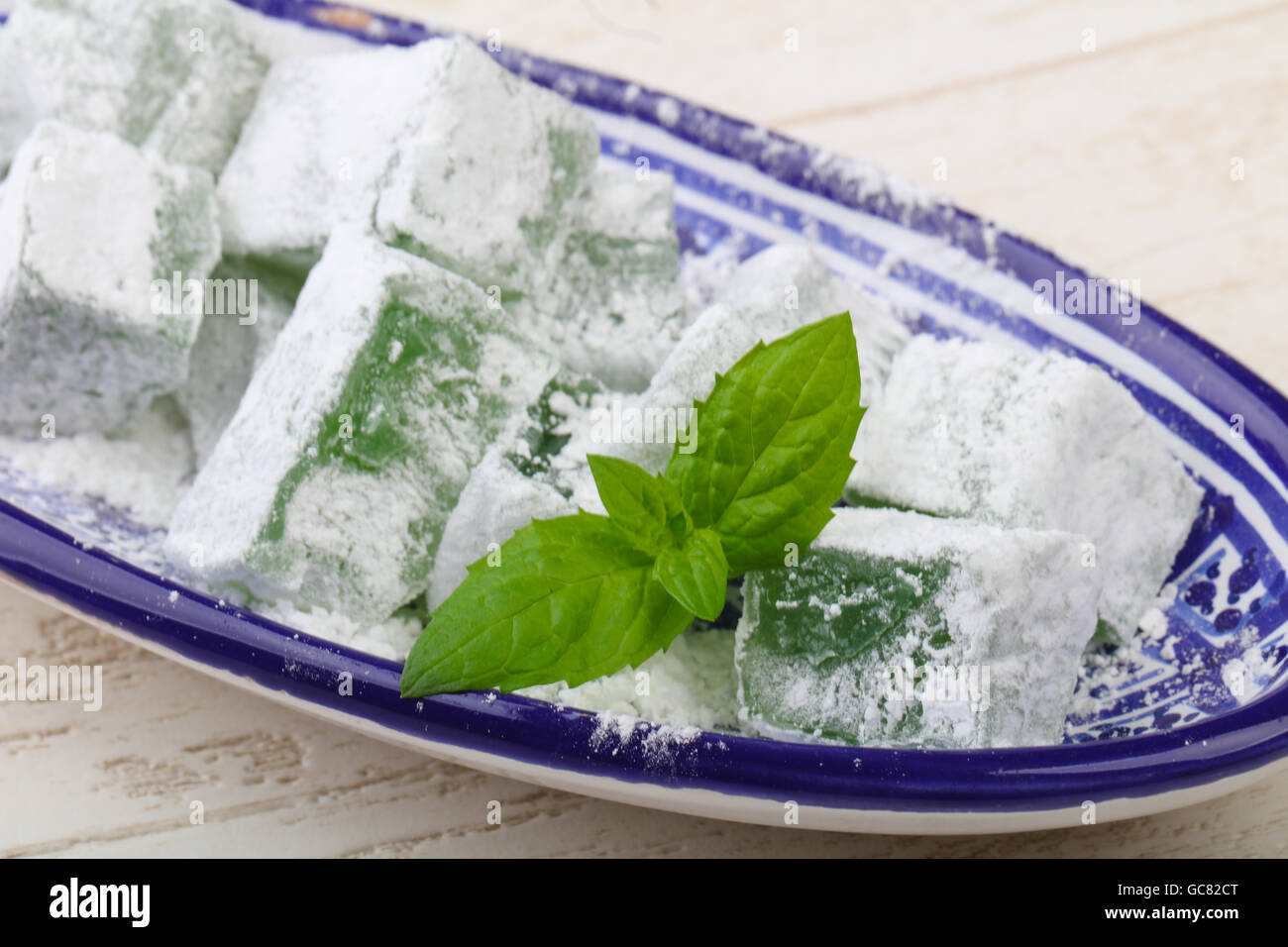 Sweet Mint lukum delight in shugar powder Stock Photo - Alamy