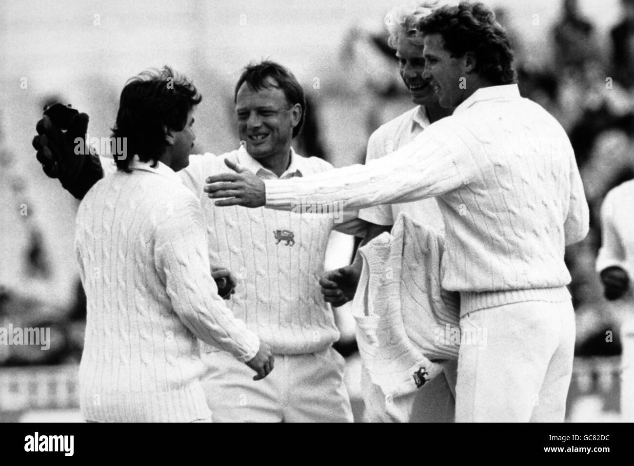 Cricket celebrating trophy smiling Black and White Stock Photos ...