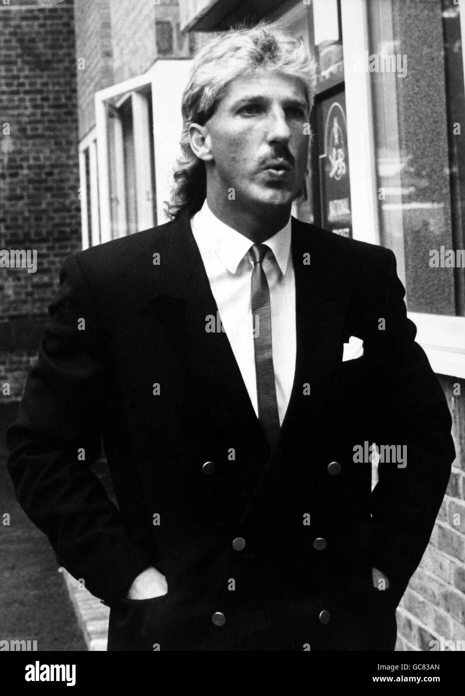 England all-rounder Ian Botham leaving Lord's London today after he was ...