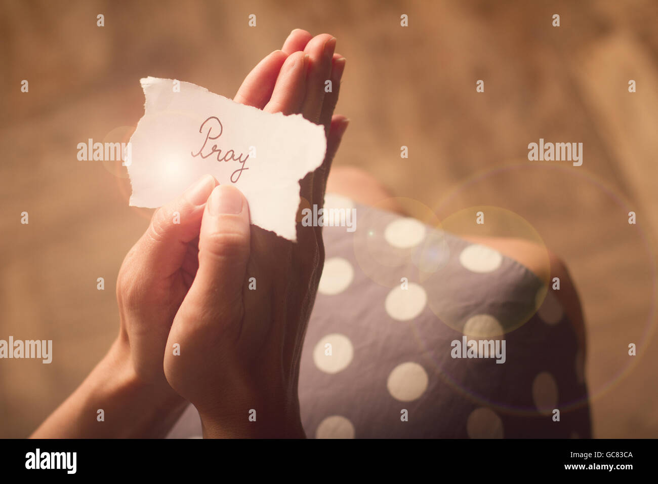 Woman holding hands in prayer hi-res stock photography and images - Alamy
