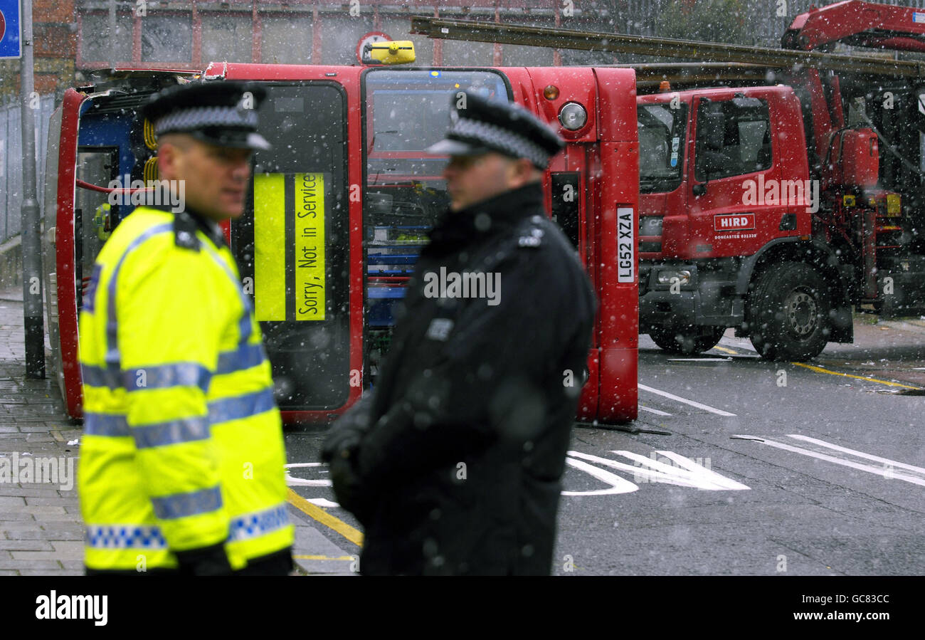 The scene in Clapham, south London after a double-decker bus overturned ...