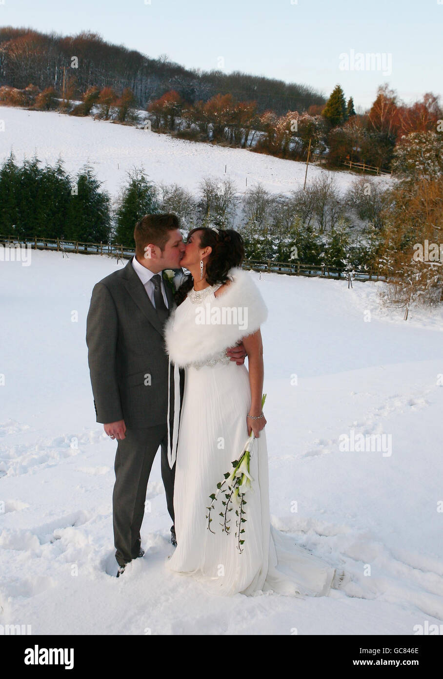 Newly married Jonathan and Karen Lee pose for photographs as they leave ...