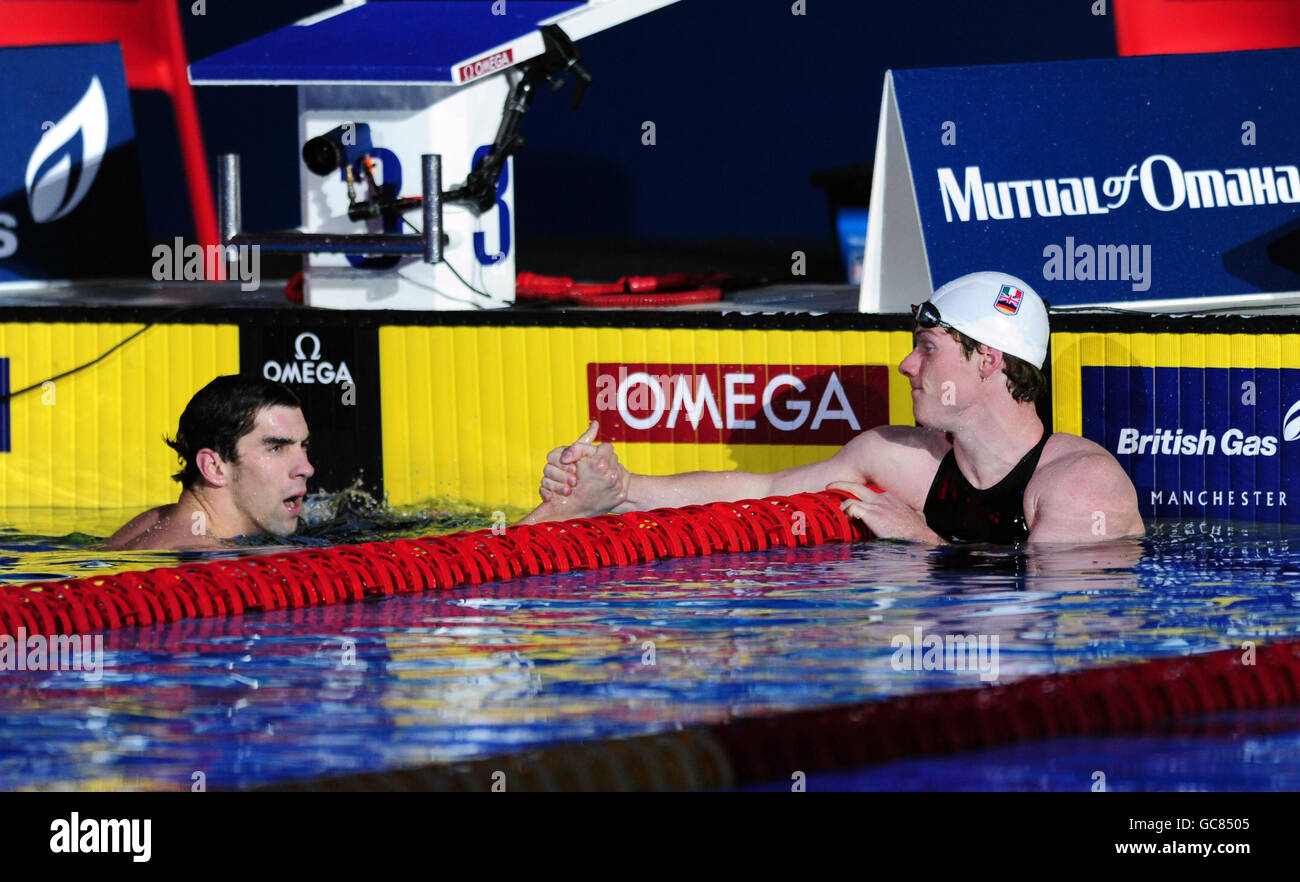 Great Britain's Michael Rock representing the E-Stars (right) shakes ...