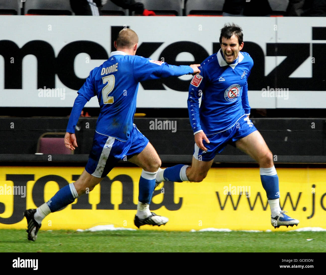 Danny Schofield celebrates with Alan Dunne after scoring Millwall's ...