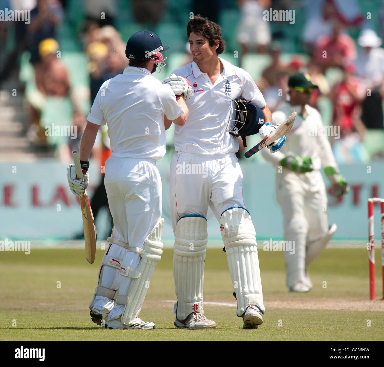 England's Alastair Cook celebrates reaching his century with teammate ...