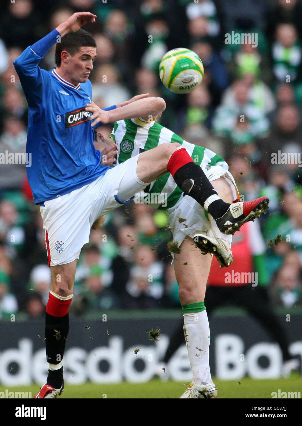 Soccer rangers full length tackling mangsm hi-res stock photography and ...