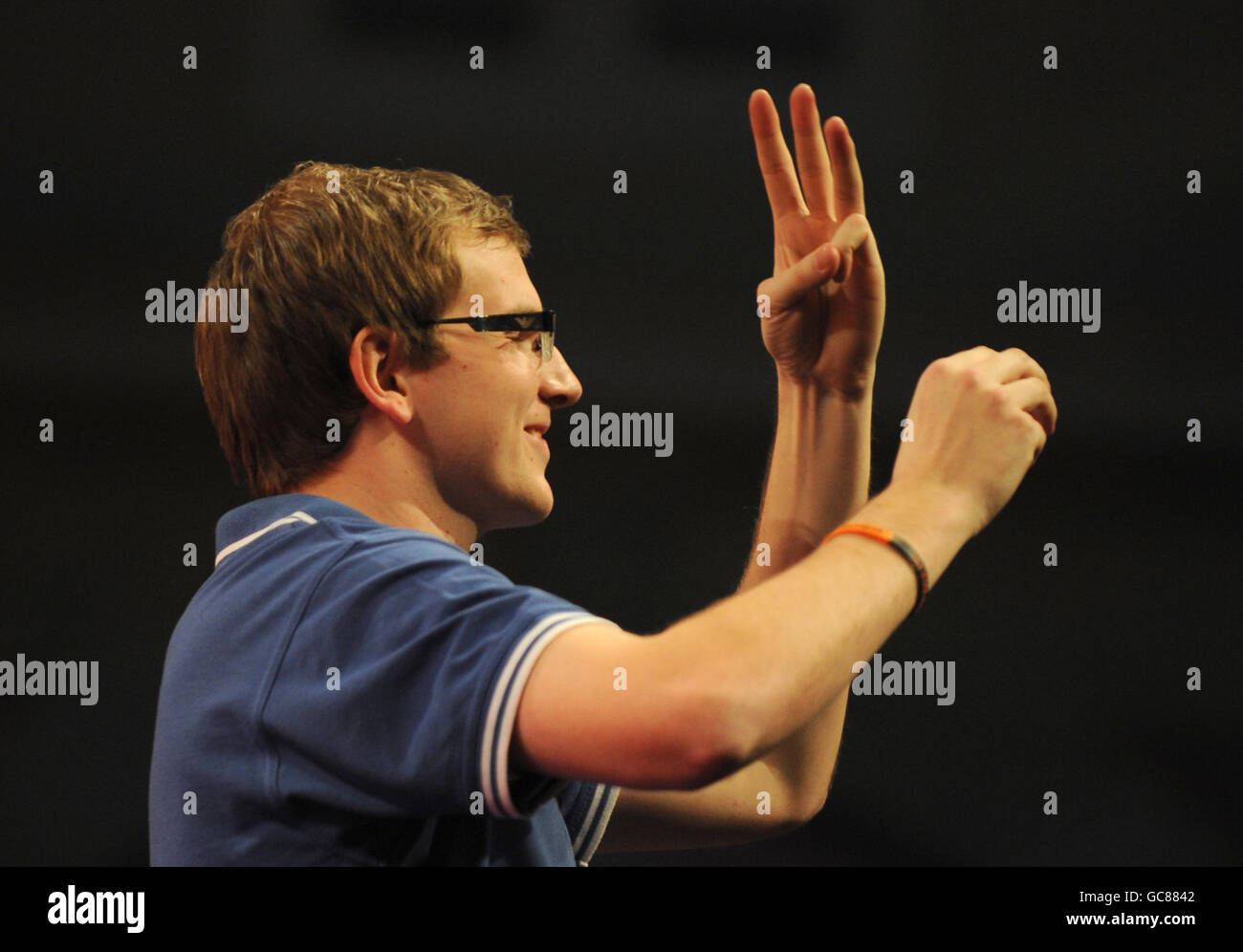 Mark Webster celebrates beating Raymond Van Barneveld in their runners ...