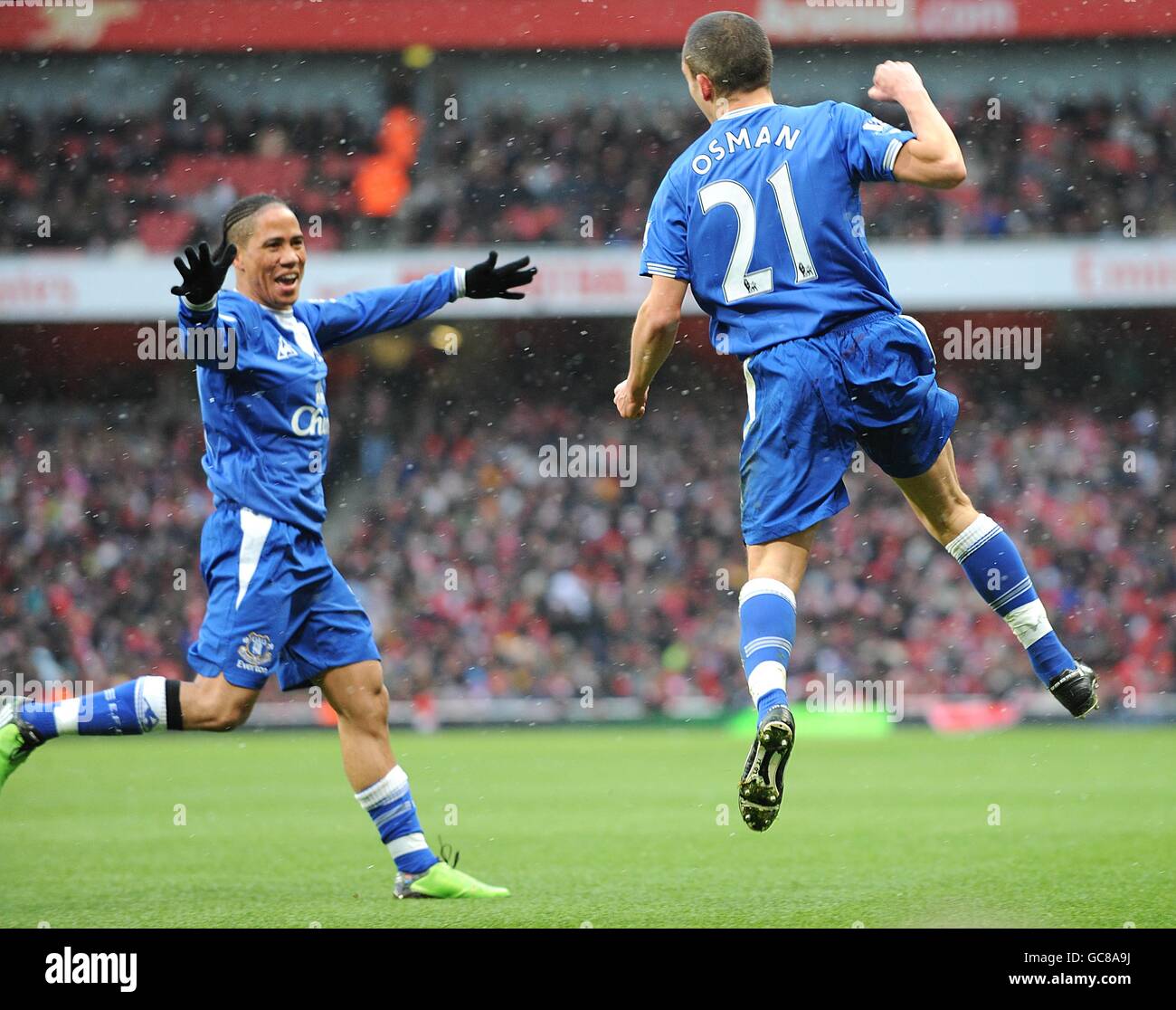 Everton's Leon Osman (right) celebrates with his team mate Steven ...