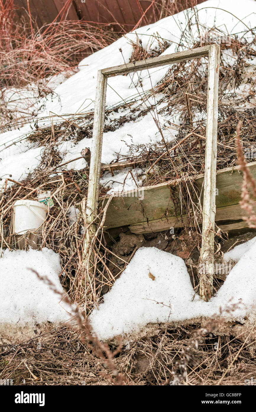 Old abandoned wooden window frame on snow Stock Photo - Alamy