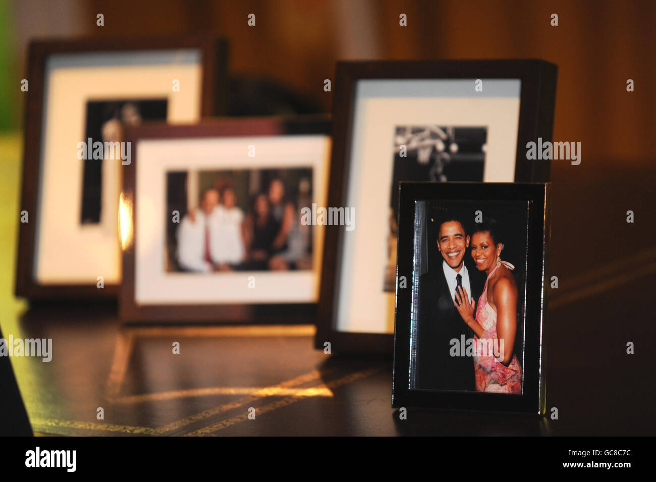 A selection of family photographs on the Resolute desk as a new waxwork ...