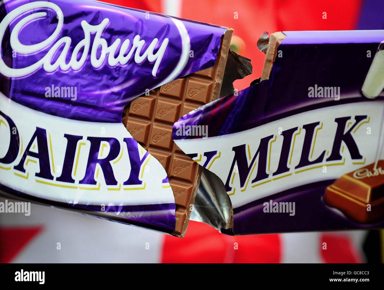 A lone protestor breaks a Cadbury chocolate bar outside the Bournville ...