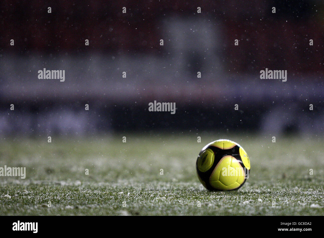 A general view of a match day ball on the snowy ground Stock Photo - Alamy