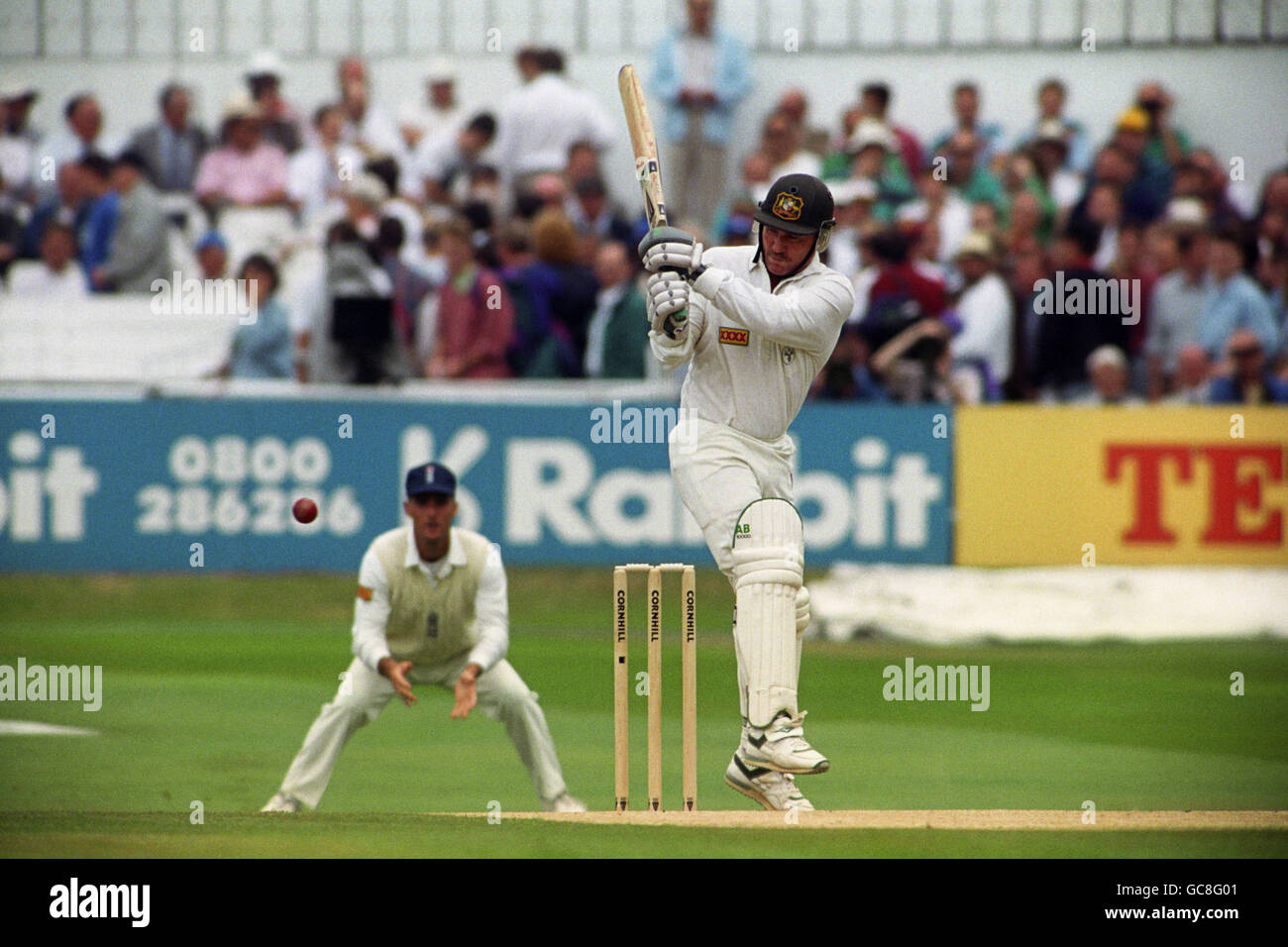AUSTRALIA CAPTAIN ALLAN BORDER HITS OUT TO THE BOUNDARY ON THE THIRD ...