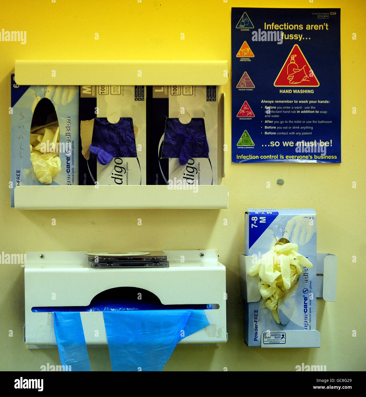 Gloves next to infection warning sign at selly oak hospital hi-res ...
