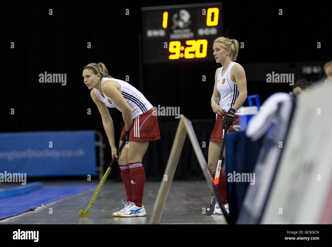 England's Chloe Strong and Susie Gilbert wait to come on during their ...