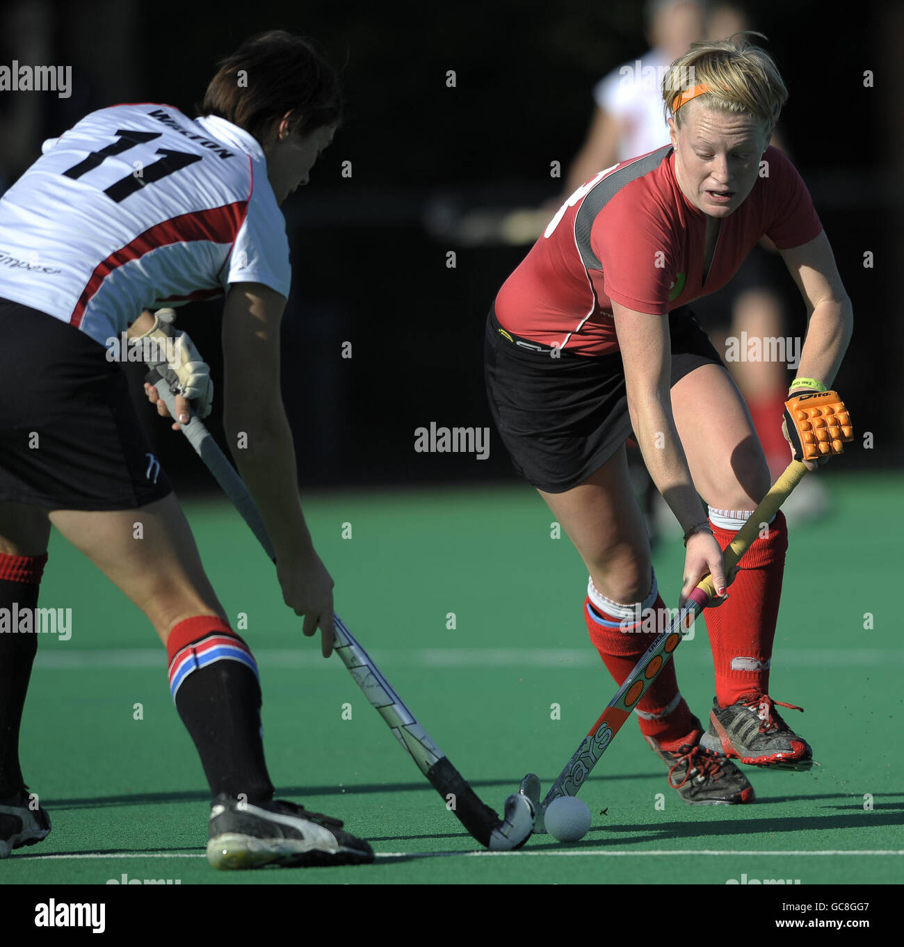 Canterbury's Sarah Kerly challenges with Bowdon's Sally Walton during ...