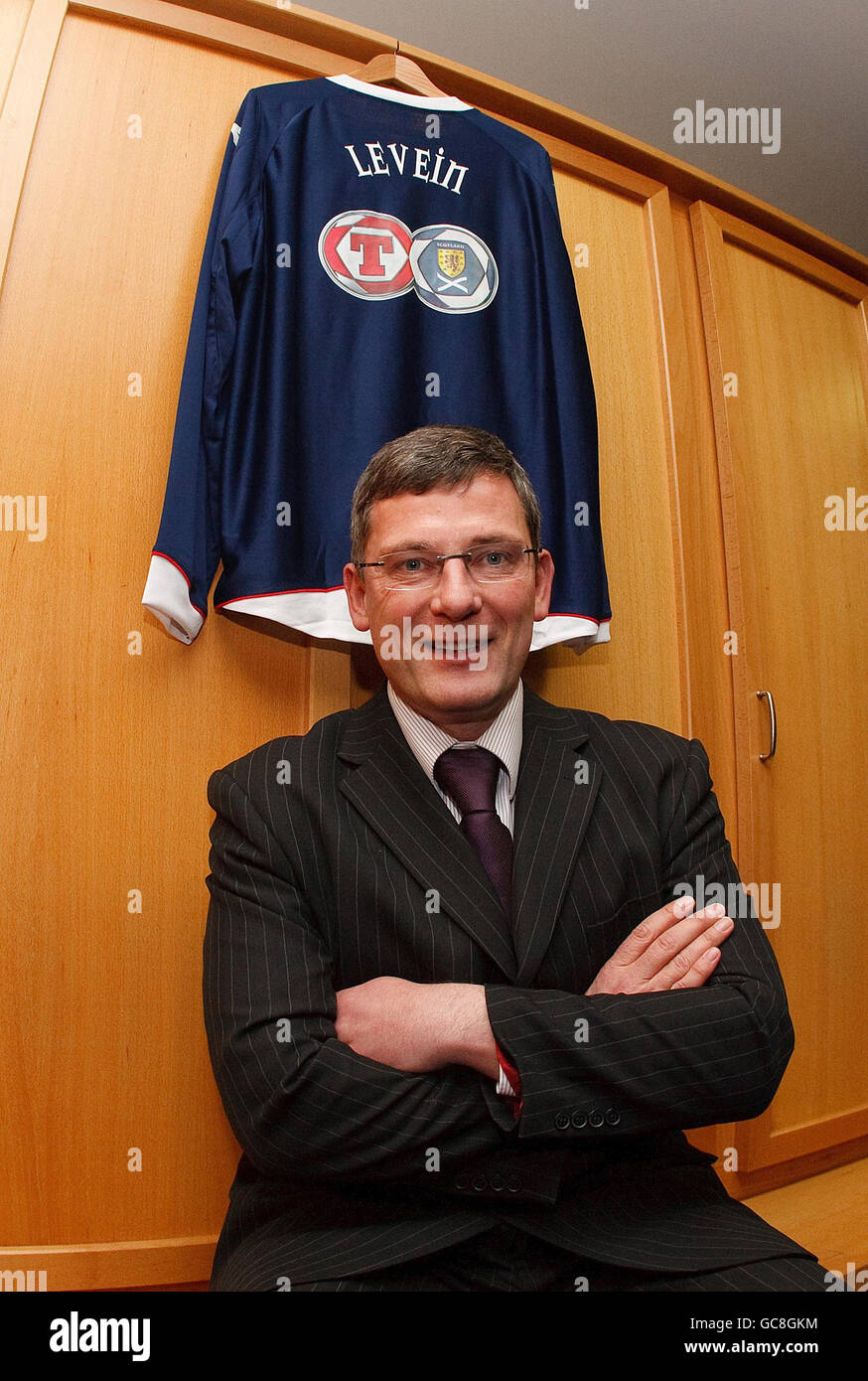 New Scotland manager Craig Levein poses with a shirt following a press ...