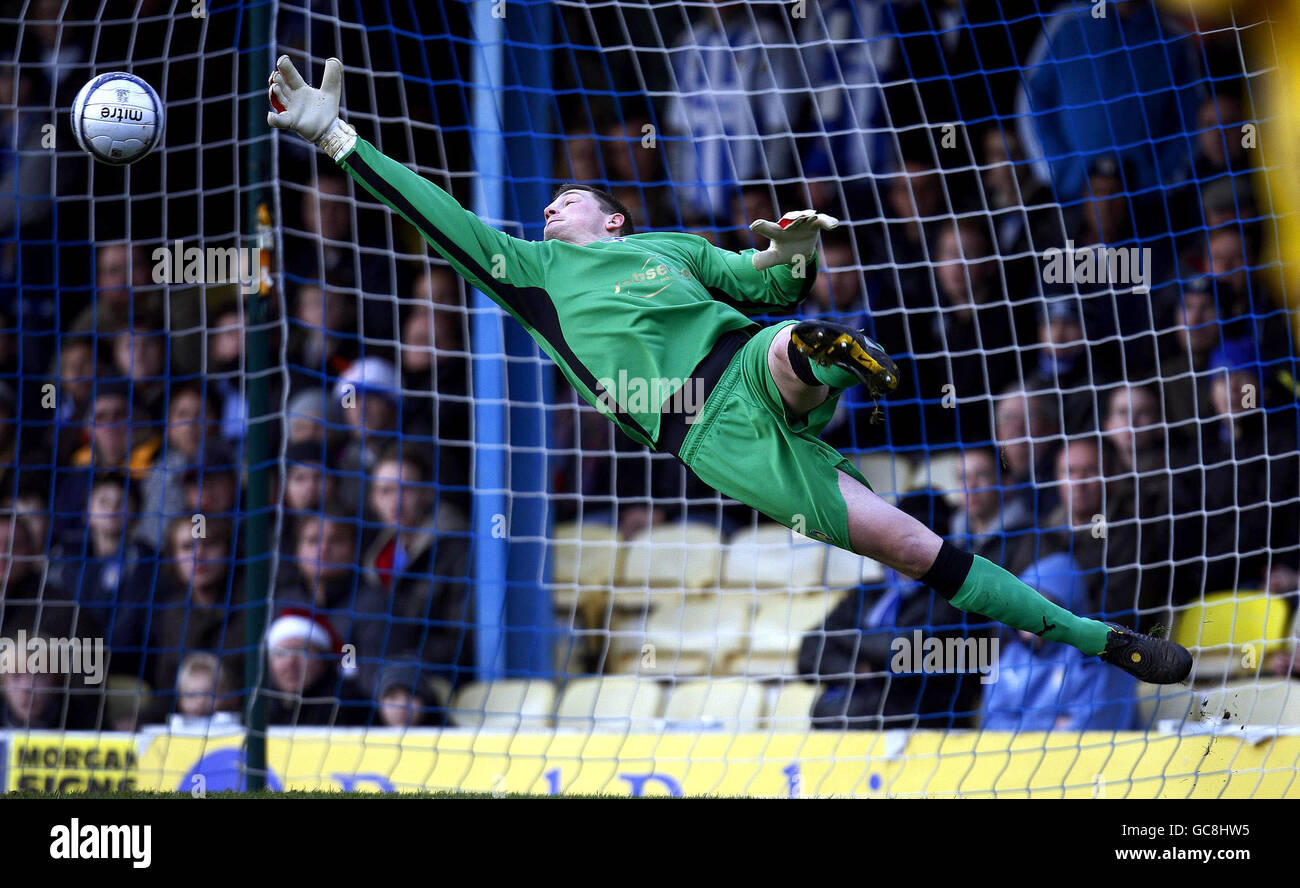 Colchester's goalkeeper Ben Williams makes a save during the Coca-Cola ...
