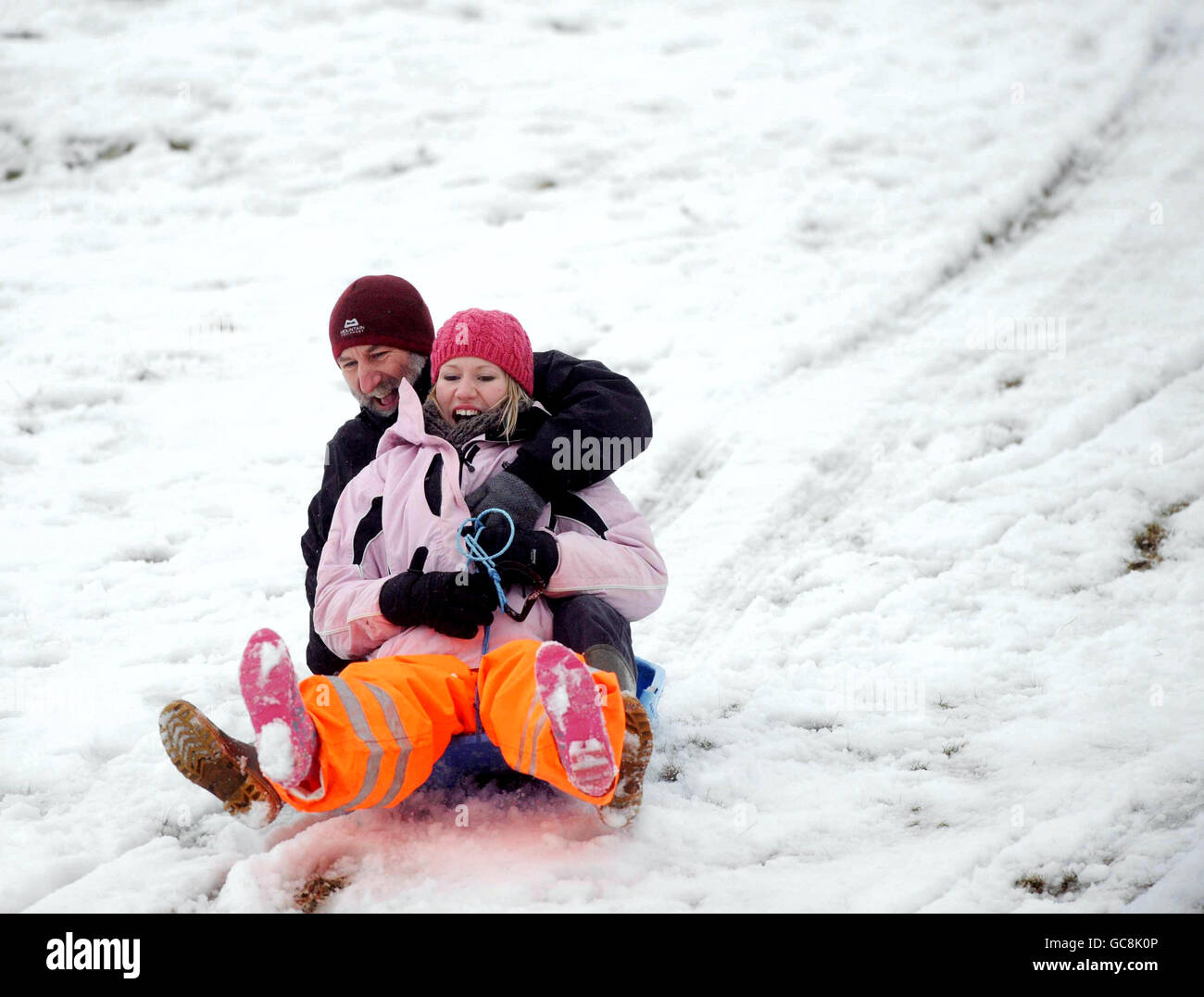 Graham Eales from Brecon and his daughter Caitlin, 25, enjoy the snow ...