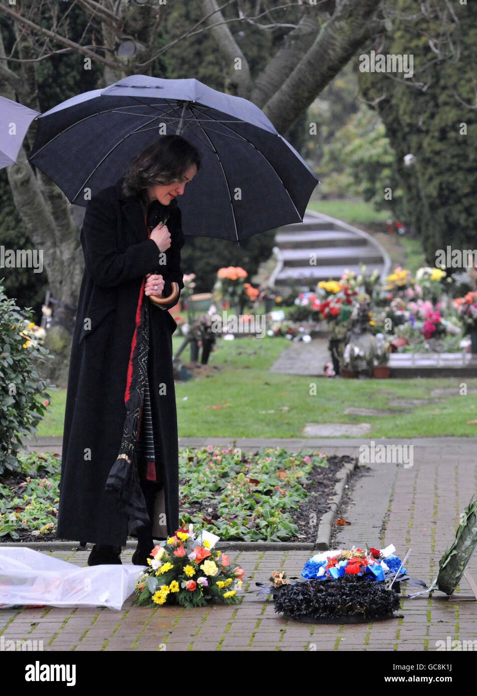 Michelle Baker views tributes at the funeral of her father Ken Baker at ...