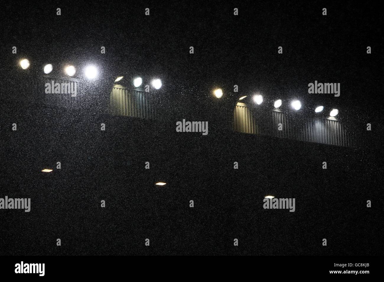 Snow falls under the floodlights at villa park hi-res stock photography and images - Alamy