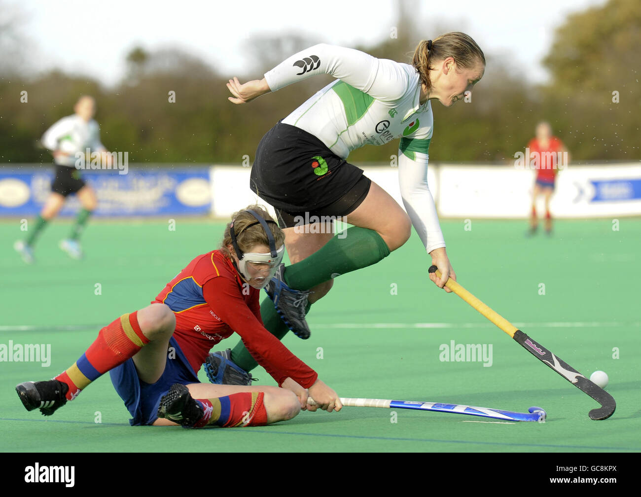 Canterbury's Mel Clewlow (right) gets past a dispairing challenge from ...