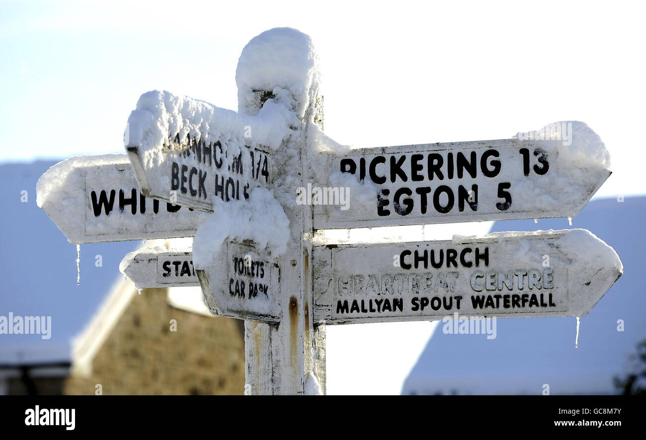 A signpost at Goathland on the North Yorkshire Moors, as heavy ...