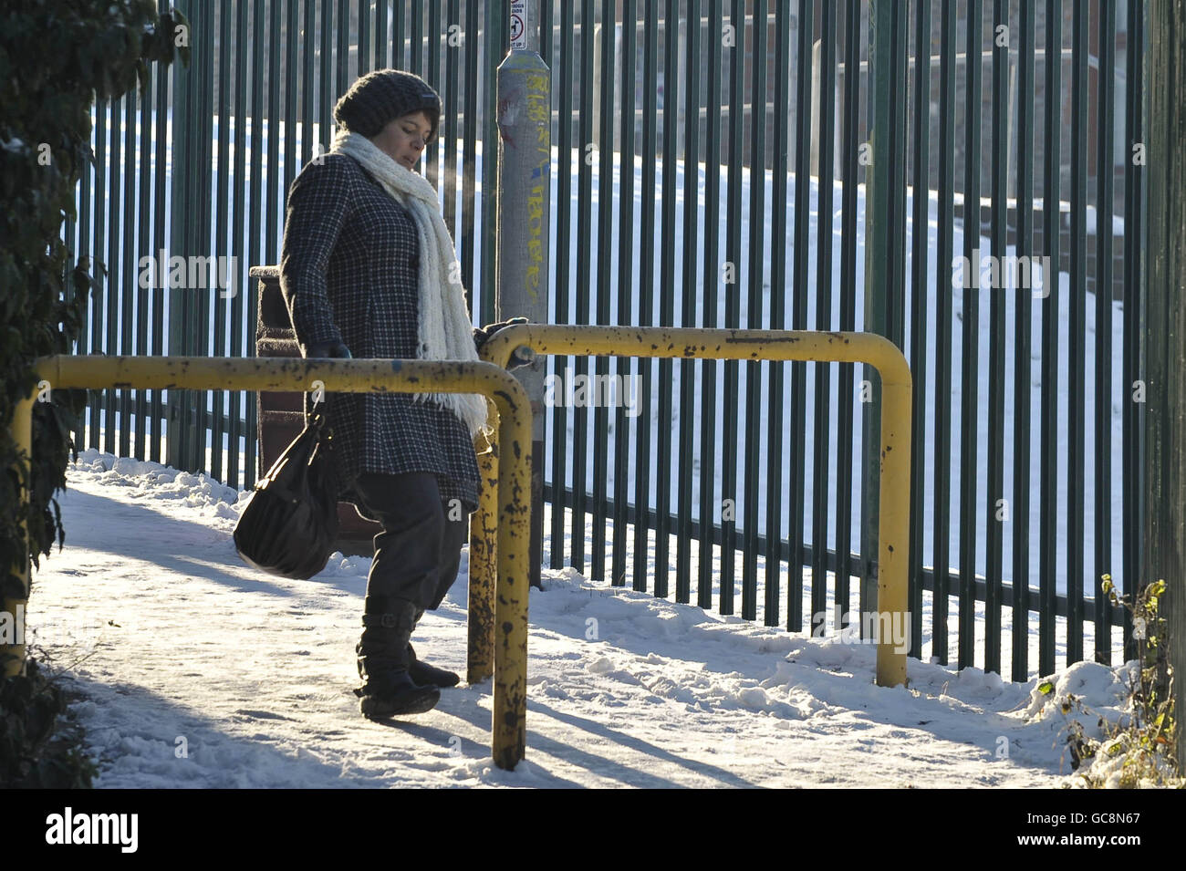 Woman loses her footing on an icy path in brislington hi-res stock ...