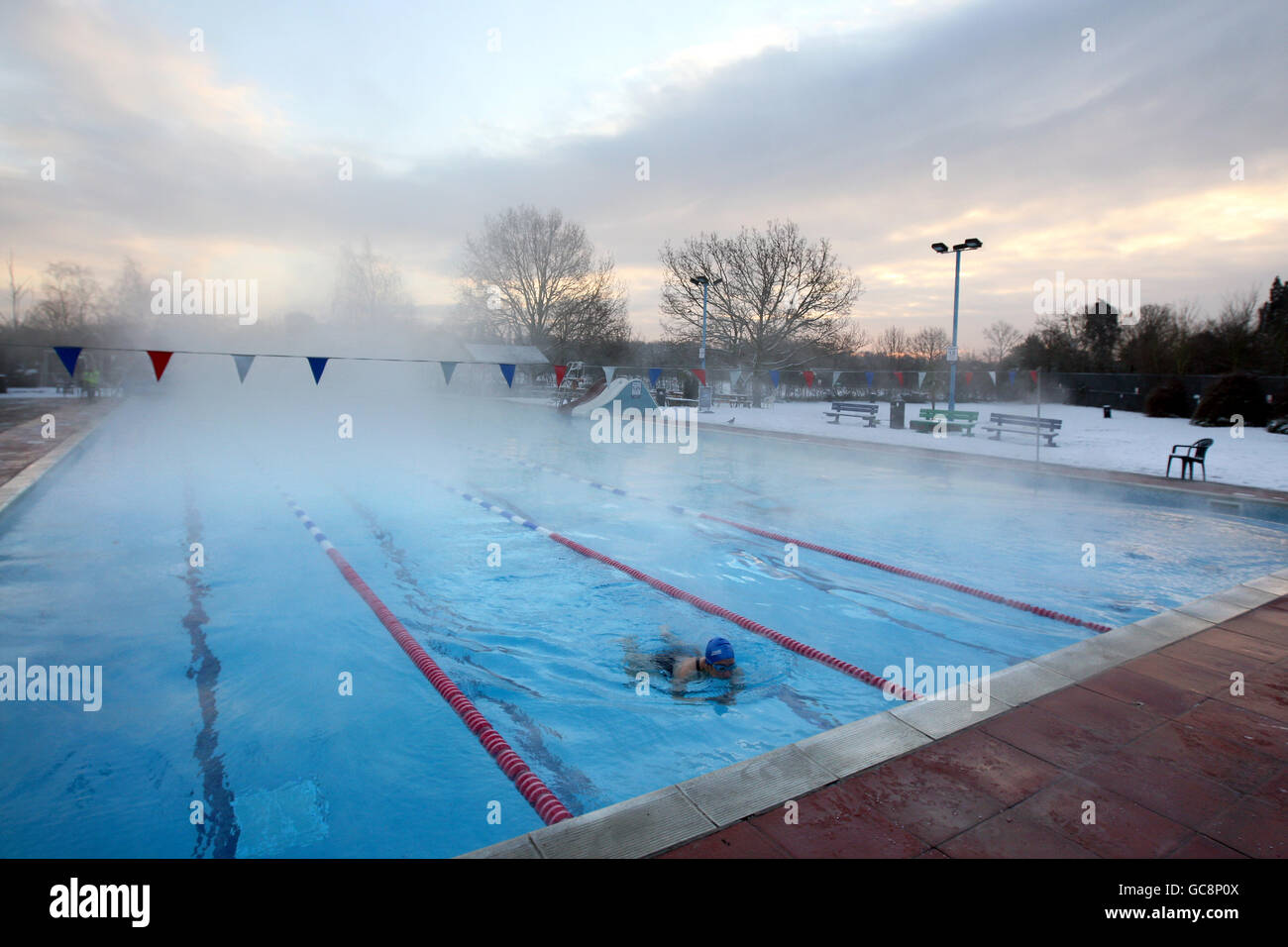 Britainimagescol swimmers use the heated outdoor pool in hampton hi-res ...