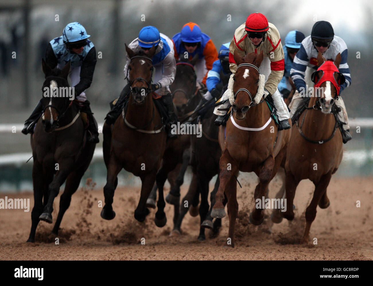 Horses go around first bend hi-res stock photography and images - Alamy