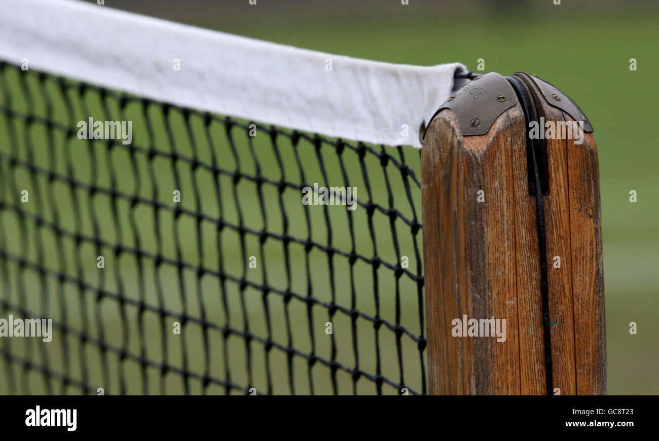 General view of a close up detail of a tennis net and wooden side ...