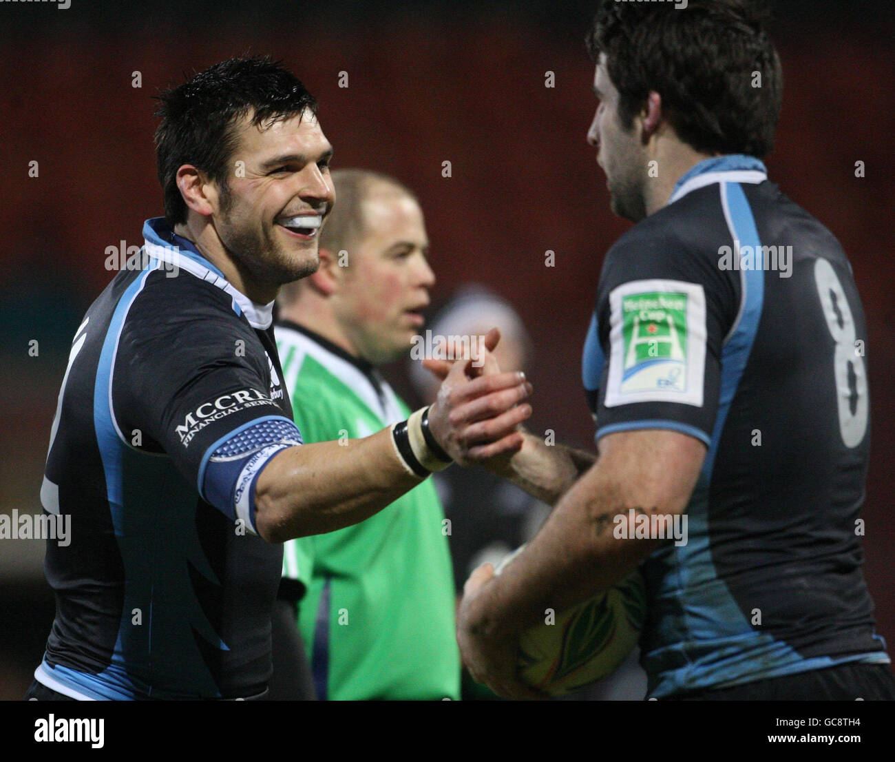 Glasgow's Rob Dewey and Johnnie Beattie celebrate a try during the ...
